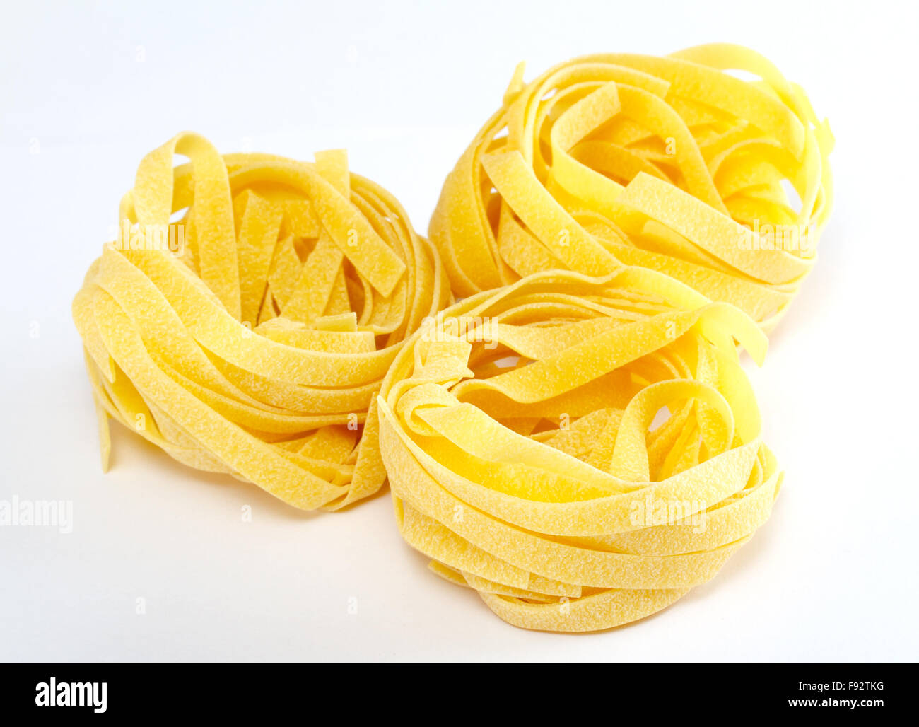 dried italian pasta (macaroni) isolated on white background Stock Photo ...