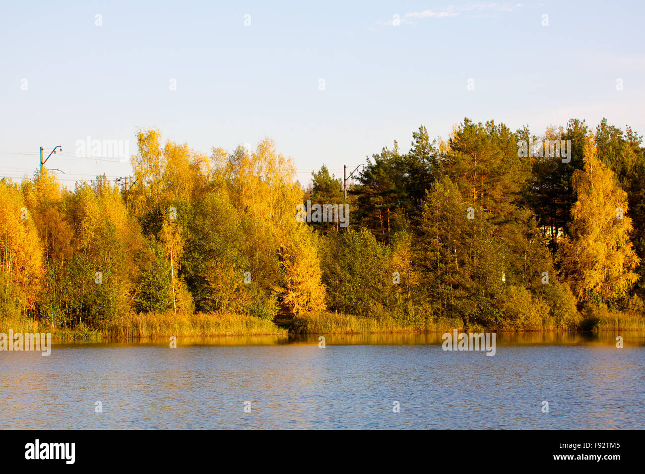 Colorful autumn trees fortress at the river front Stock Photo - Alamy