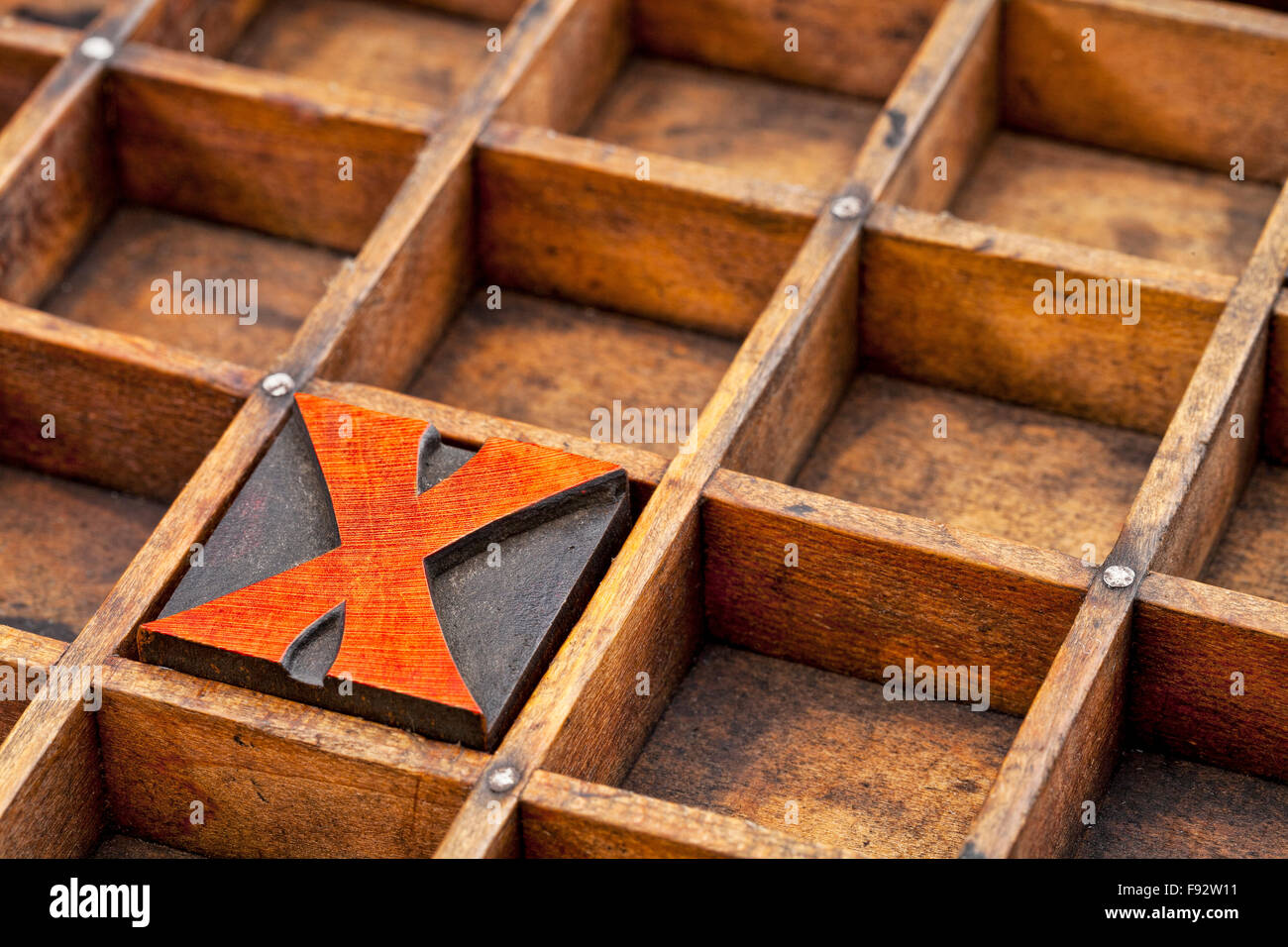 letter X abstract - vintage letterpress printing block stained by red ...