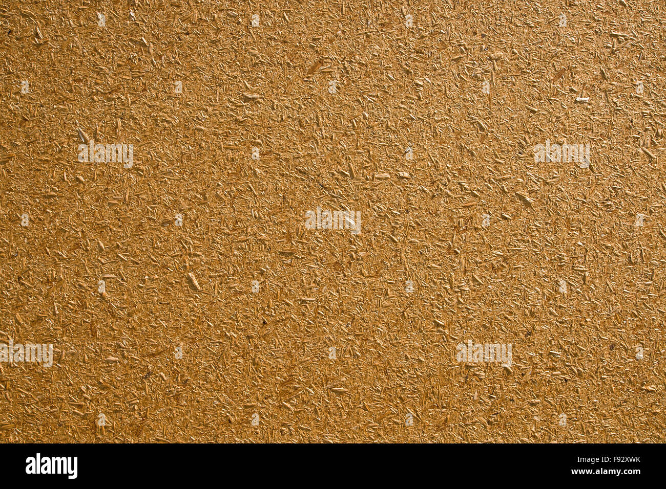 A brown flake board background Stock Photo - Alamy