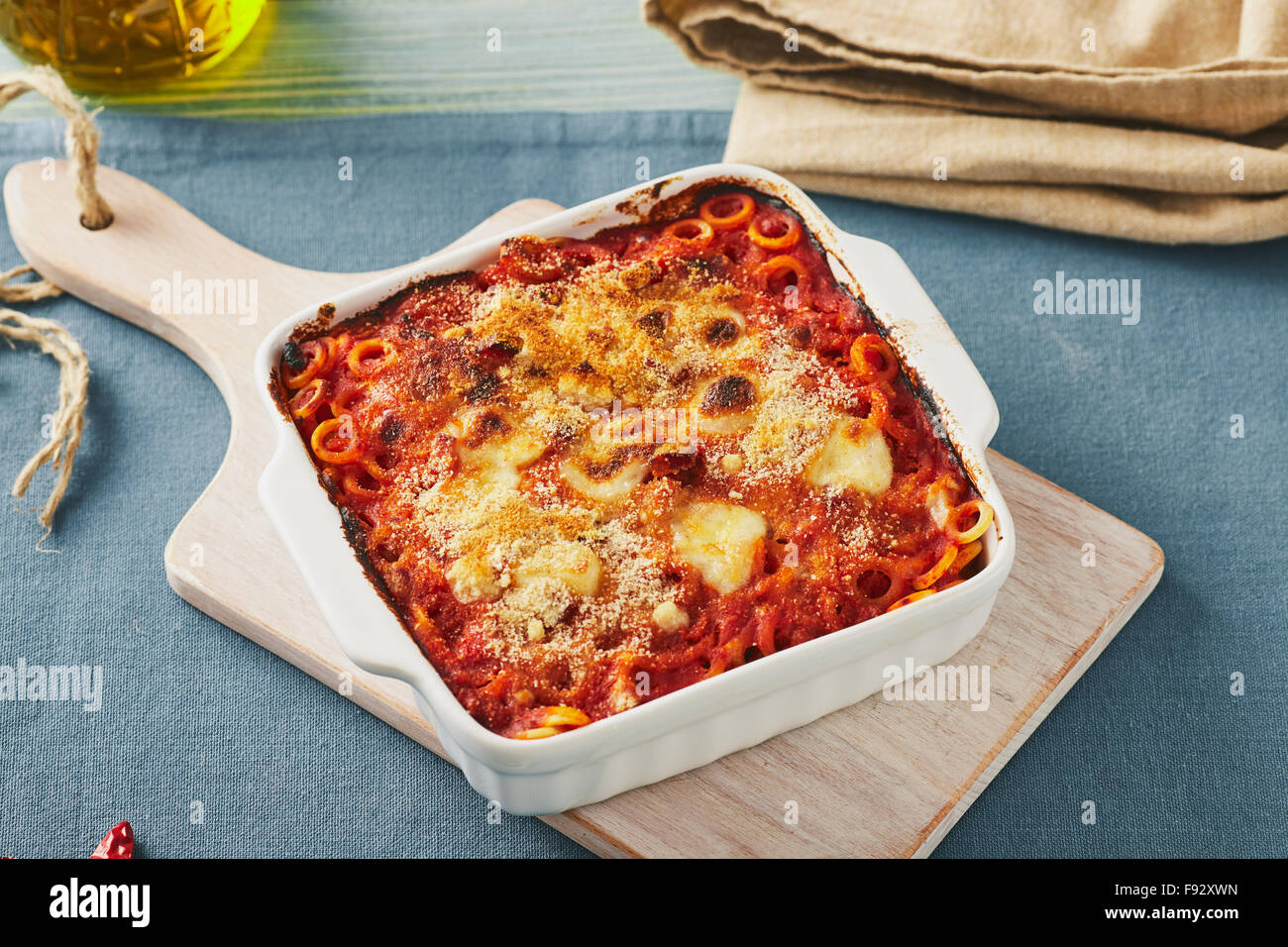 Baked anelletti pasta with mince, sauce and mozzarella. Typical ...