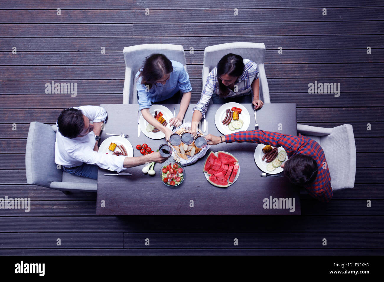 Top view people sitting dinner hi-res stock photography and images - Alamy