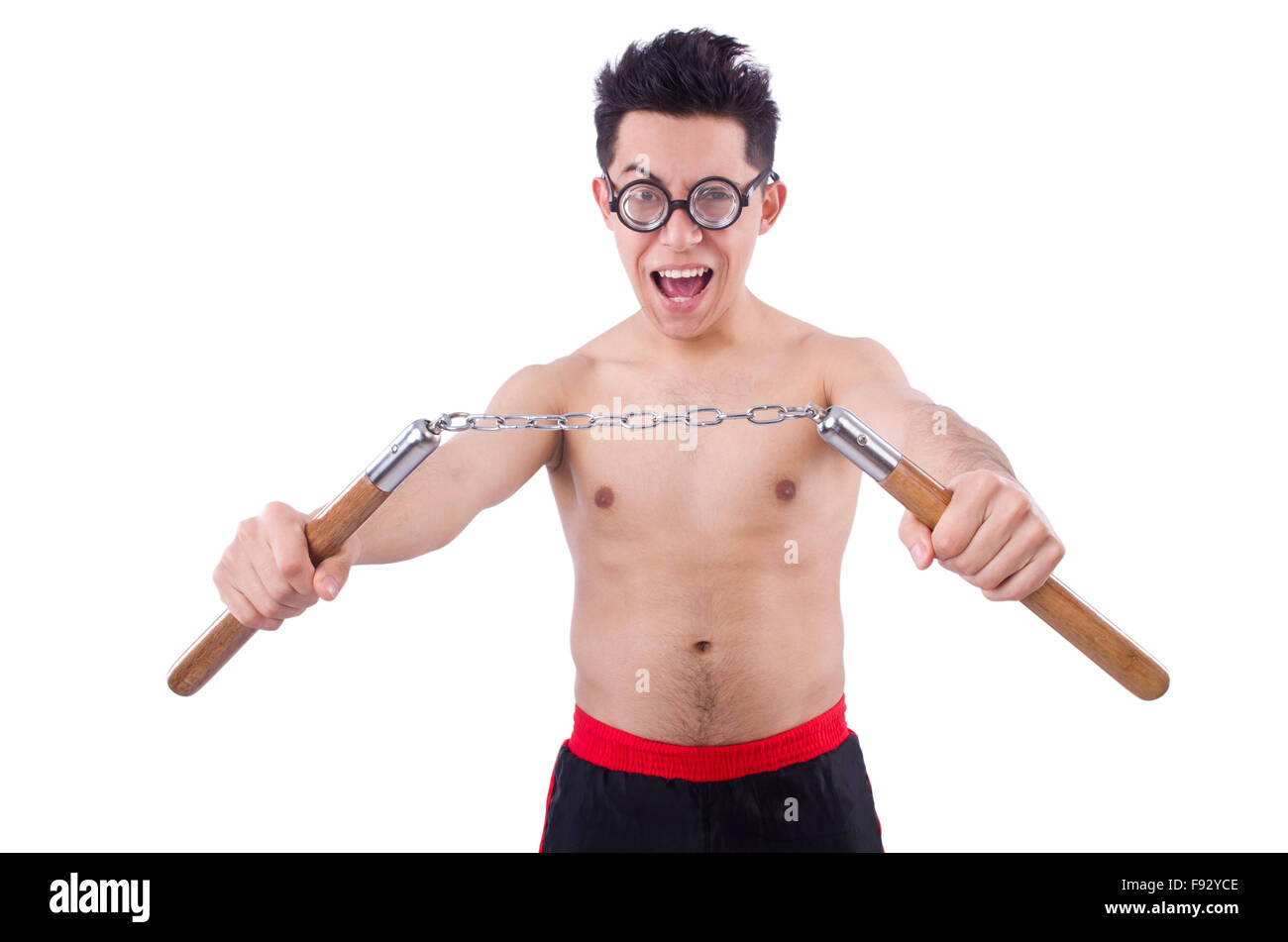 Funny guy with nunchucks on white Stock Photo - Alamy