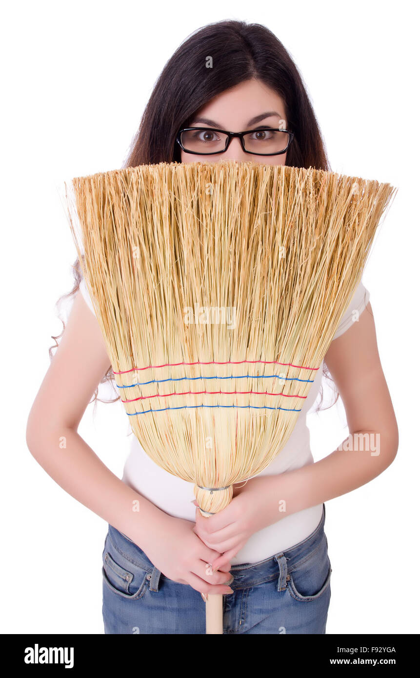 Young woman with broom on white Stock Photo - Alamy