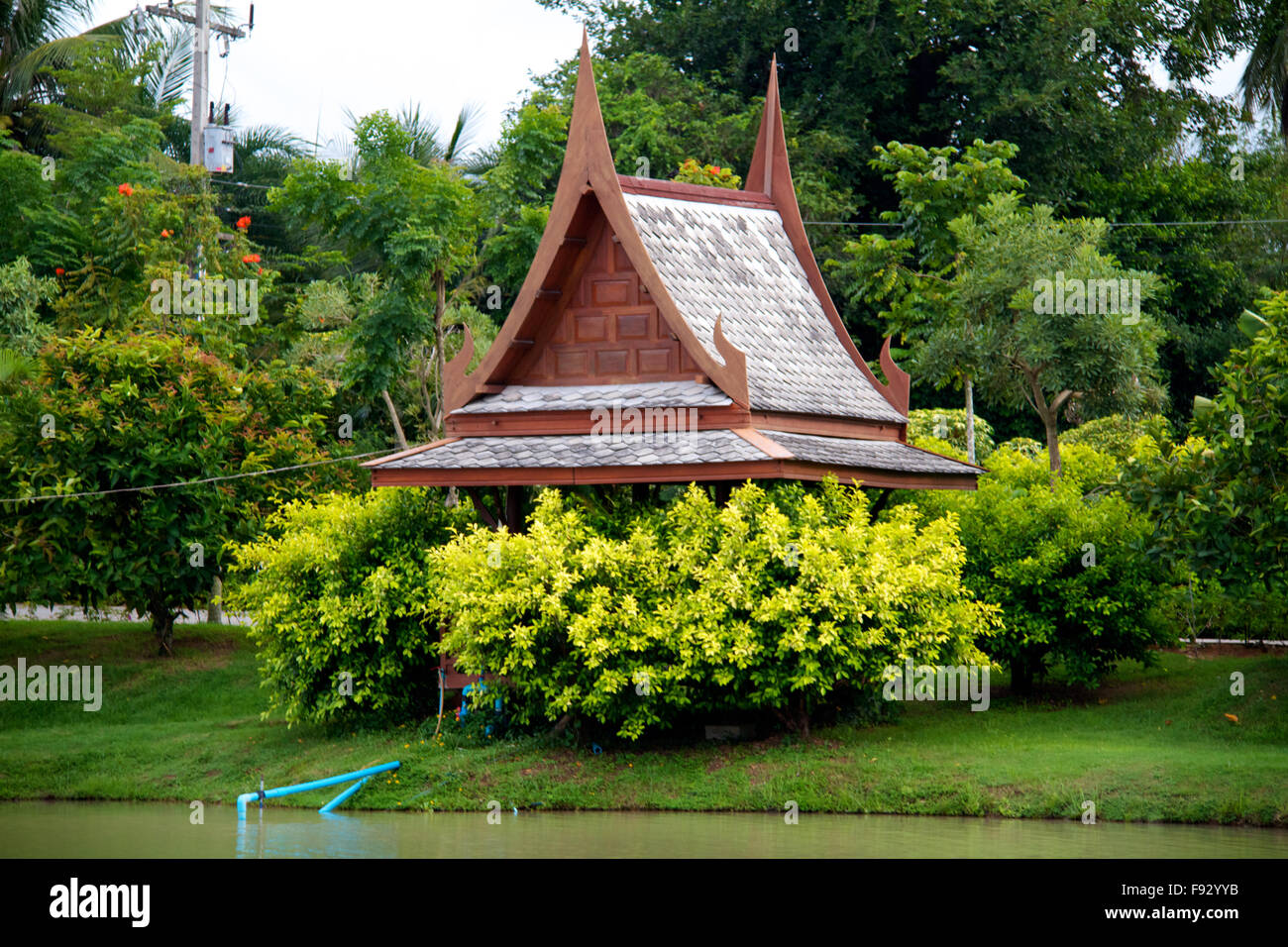Thai building on the river Stock Photo - Alamy