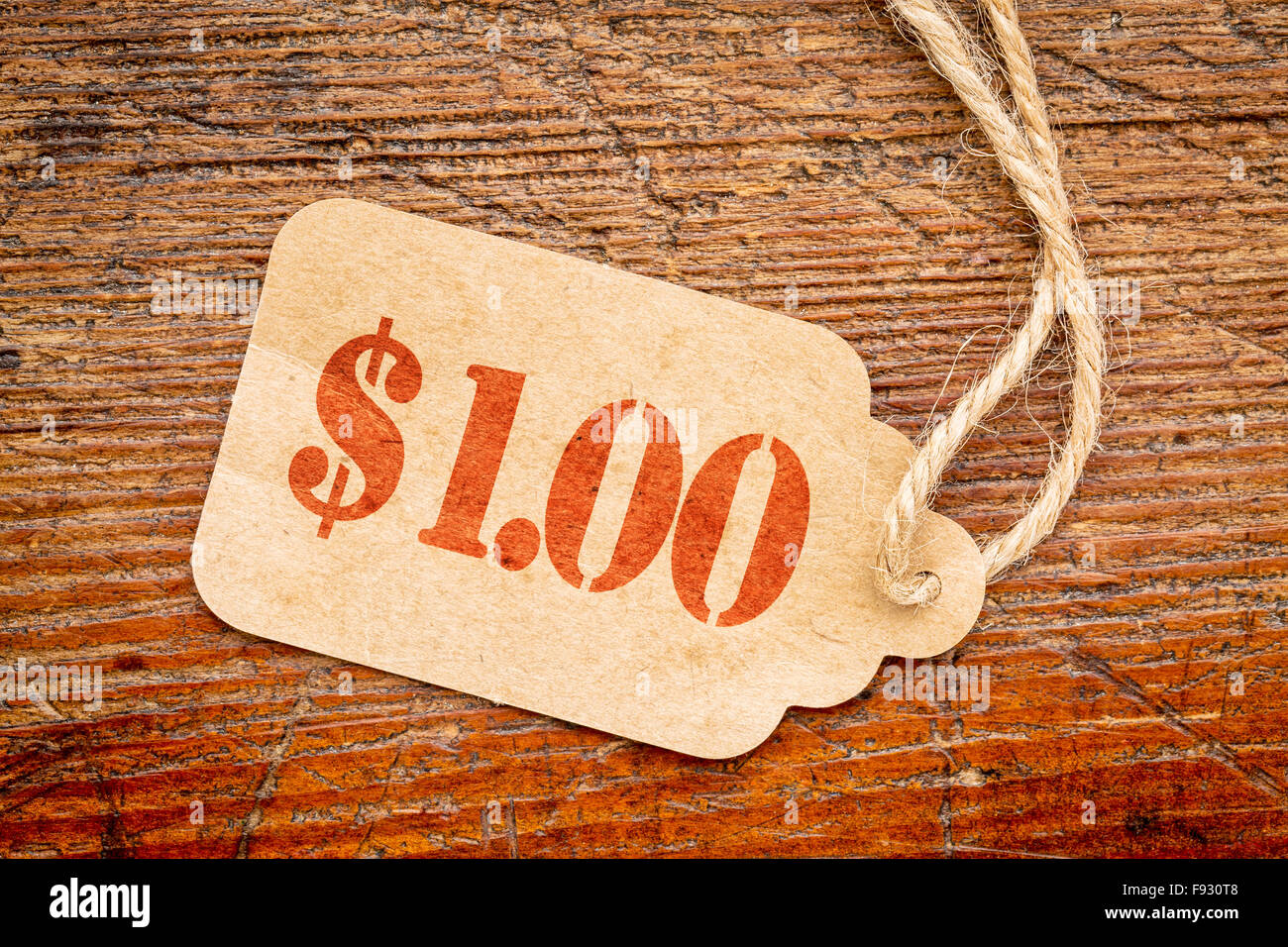 one dollar price tag price tag against a rustic barn wood - sale ...