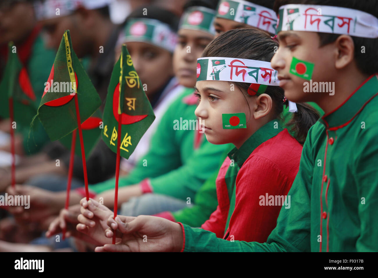 Bangladeshi child holds national flag hi-res stock photography and ...