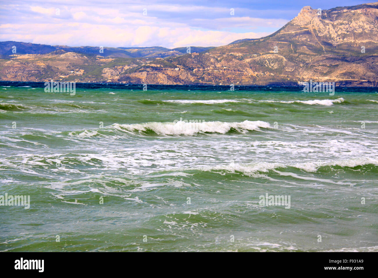 Waves on the Greek seashore Aegean sea Stock Photo - Alamy