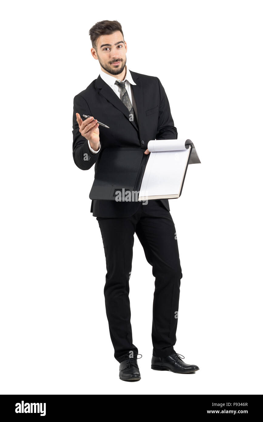 Salesman in suit giving contract and pencil looking at camera. Full ...