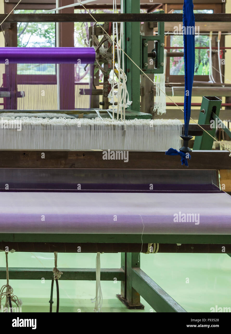 Old loom machine in the silk factory, select focus Stock Photo - Alamy