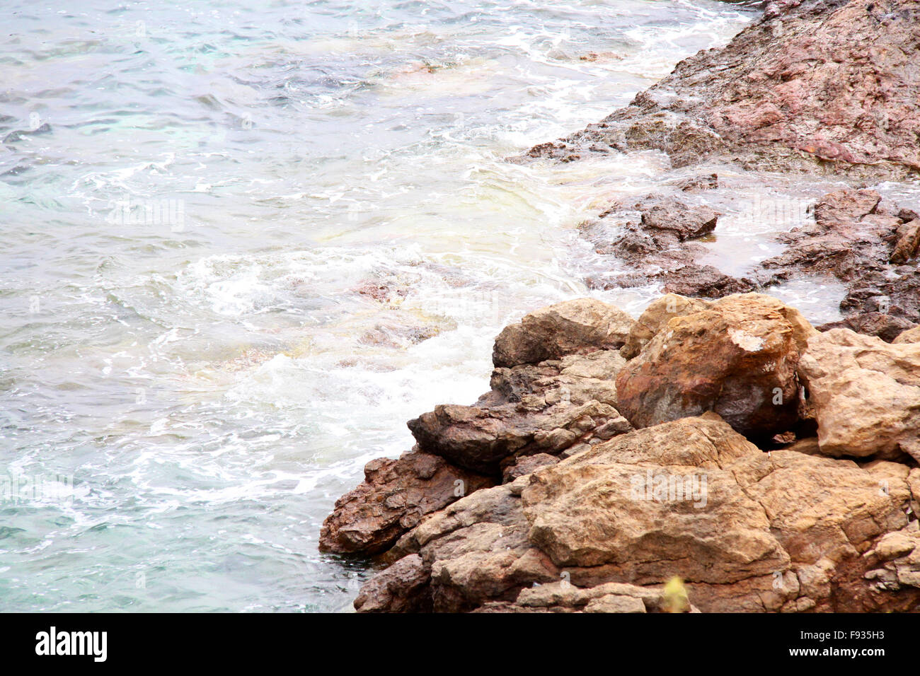 Waves on the Greek seashore Aegean sea Stock Photo - Alamy