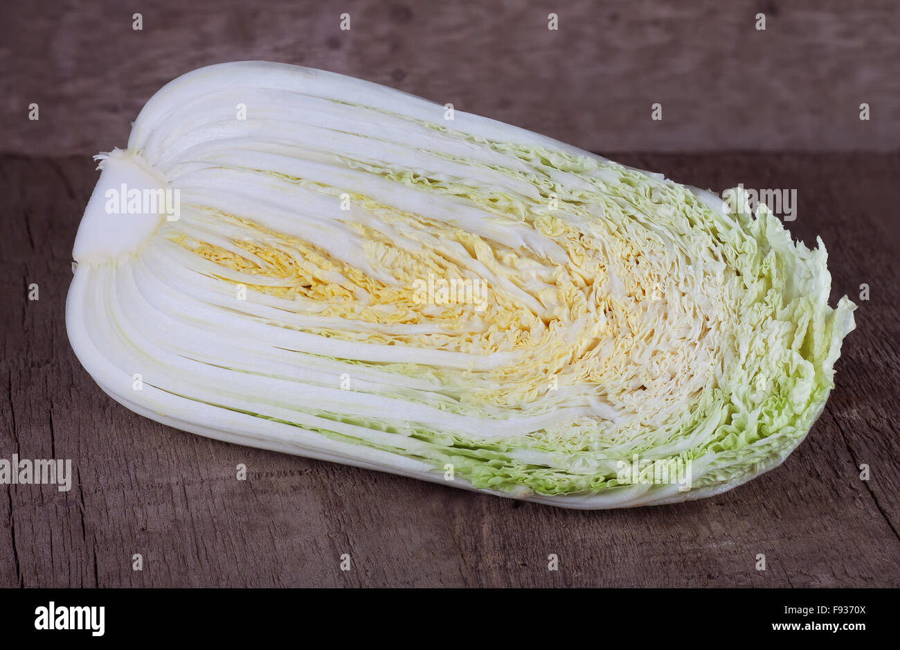 single slice of fresh chinese cabbage on a old wooden background Stock ...