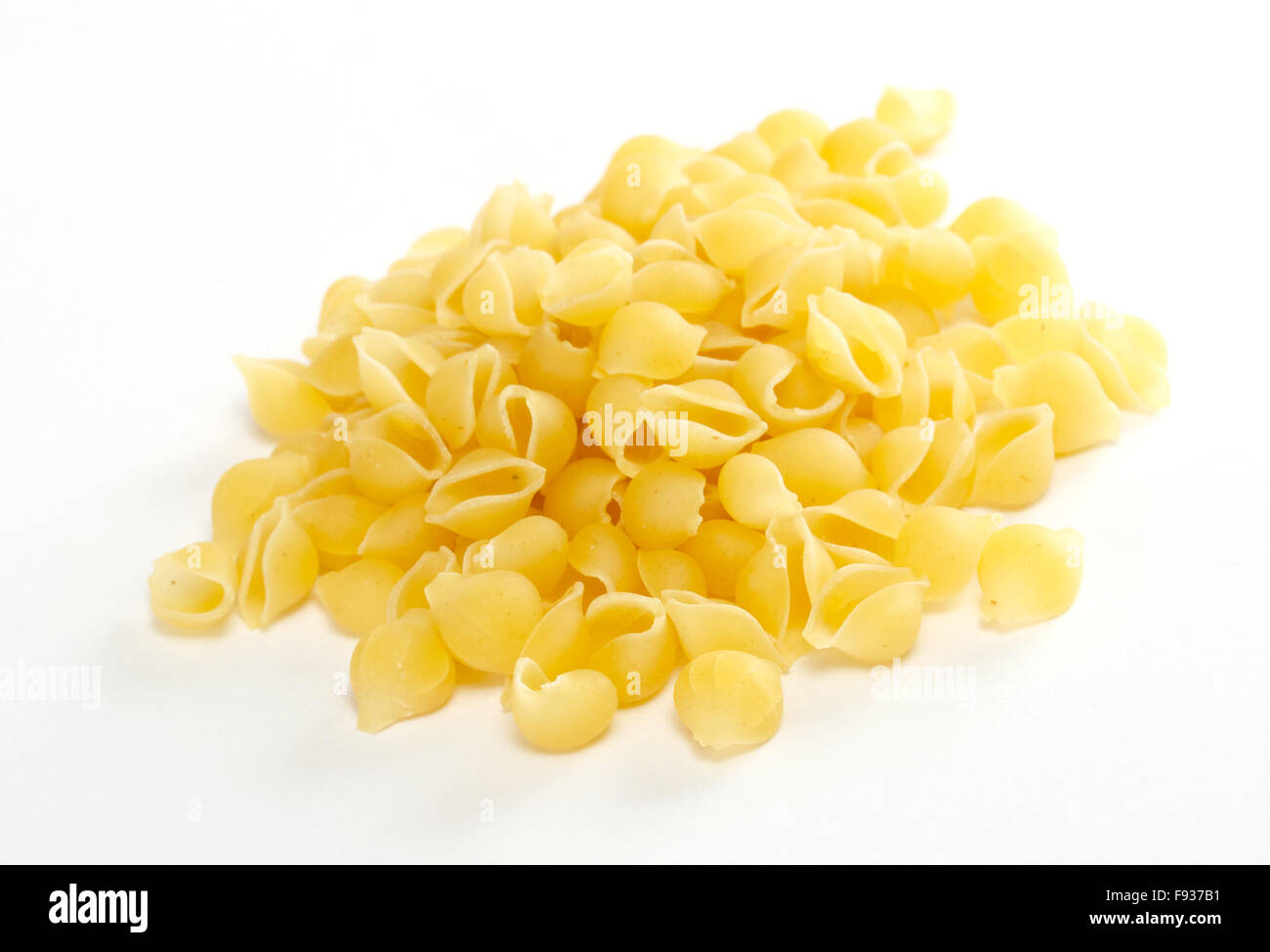 dried italian pasta (macaroni) isolated on white background Stock Photo ...