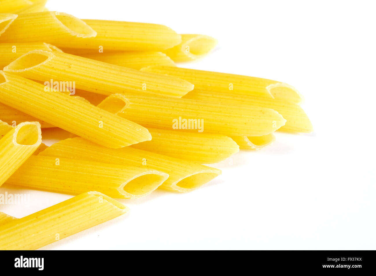 dried italian pasta (macaroni) isolated on white background Stock Photo ...