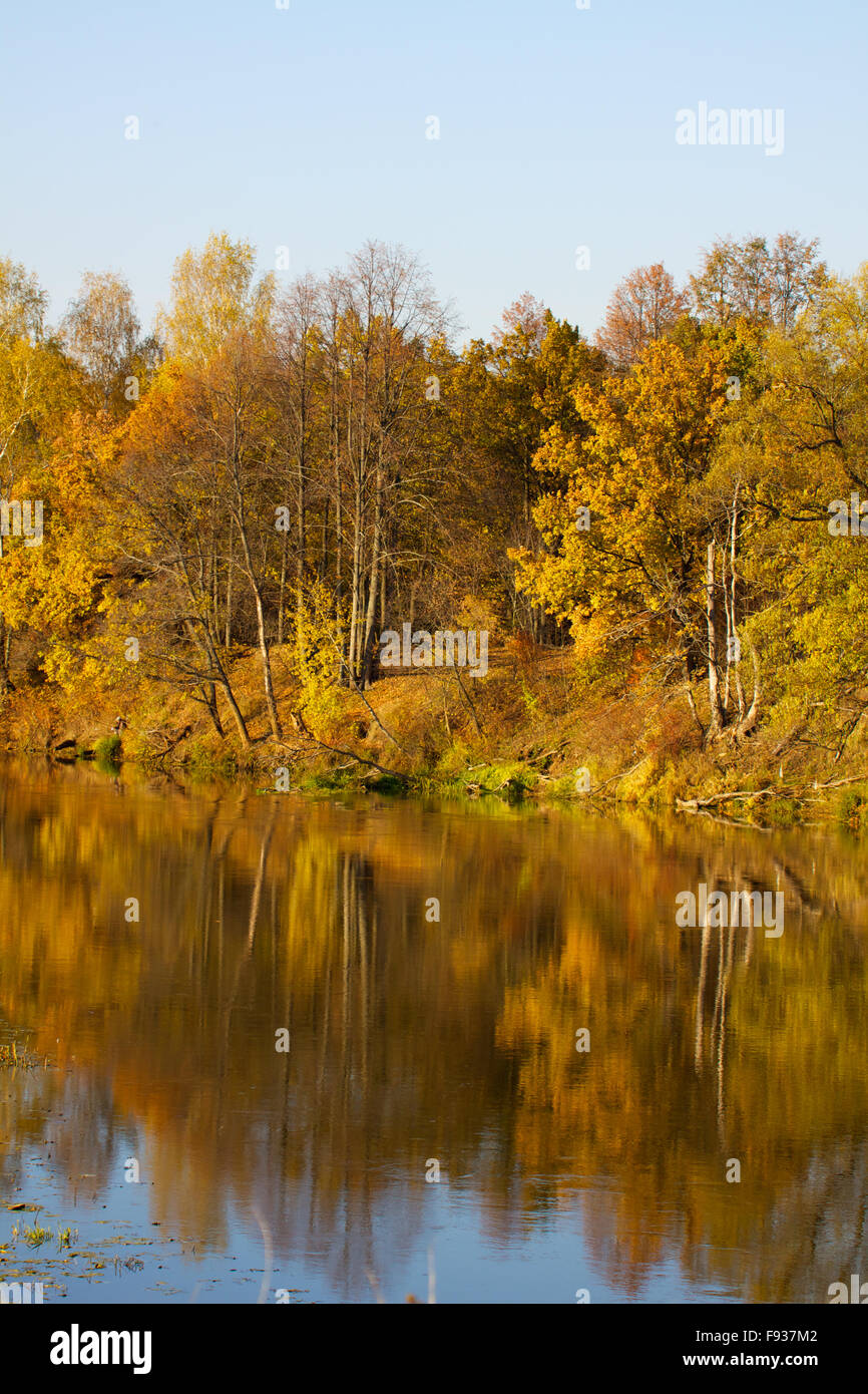 Colorful autumn trees fortress at the river front Stock Photo - Alamy