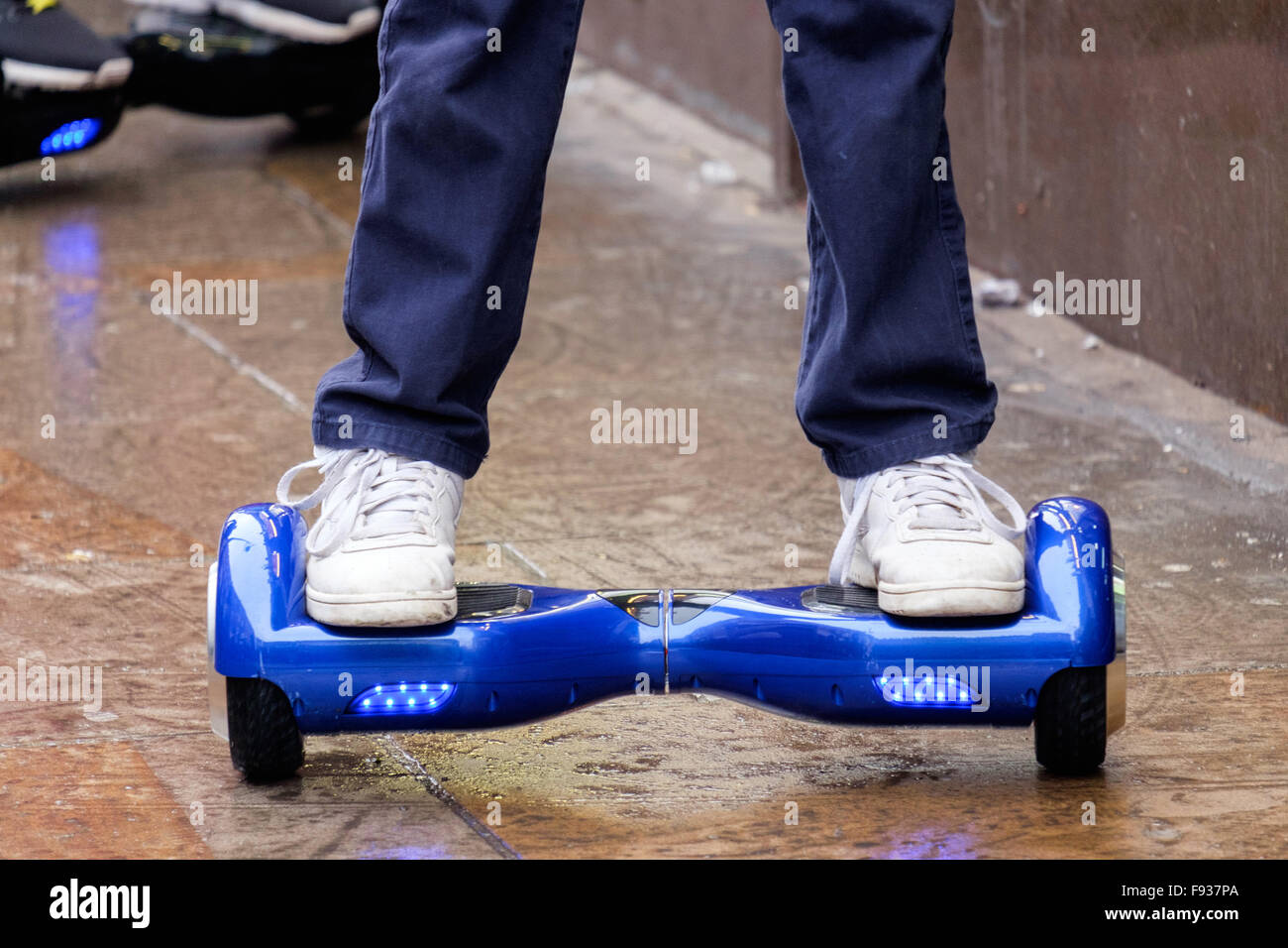 London, UK. 13th Dec, 2015. 'Hoverboard' scooters being ridden by ...