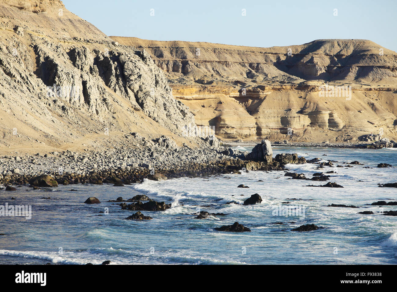 Waves breaking against rough Pacific coastline in Chile Stock Photo - Alamy