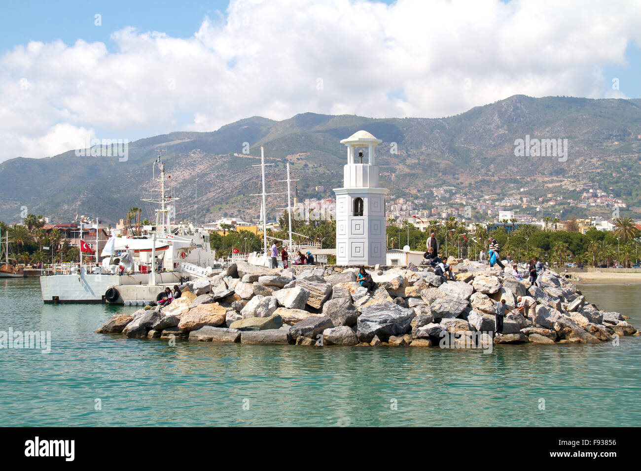 Lighthouse in port. Turkey, Alanya. Sunny weather Stock Photo - Alamy
