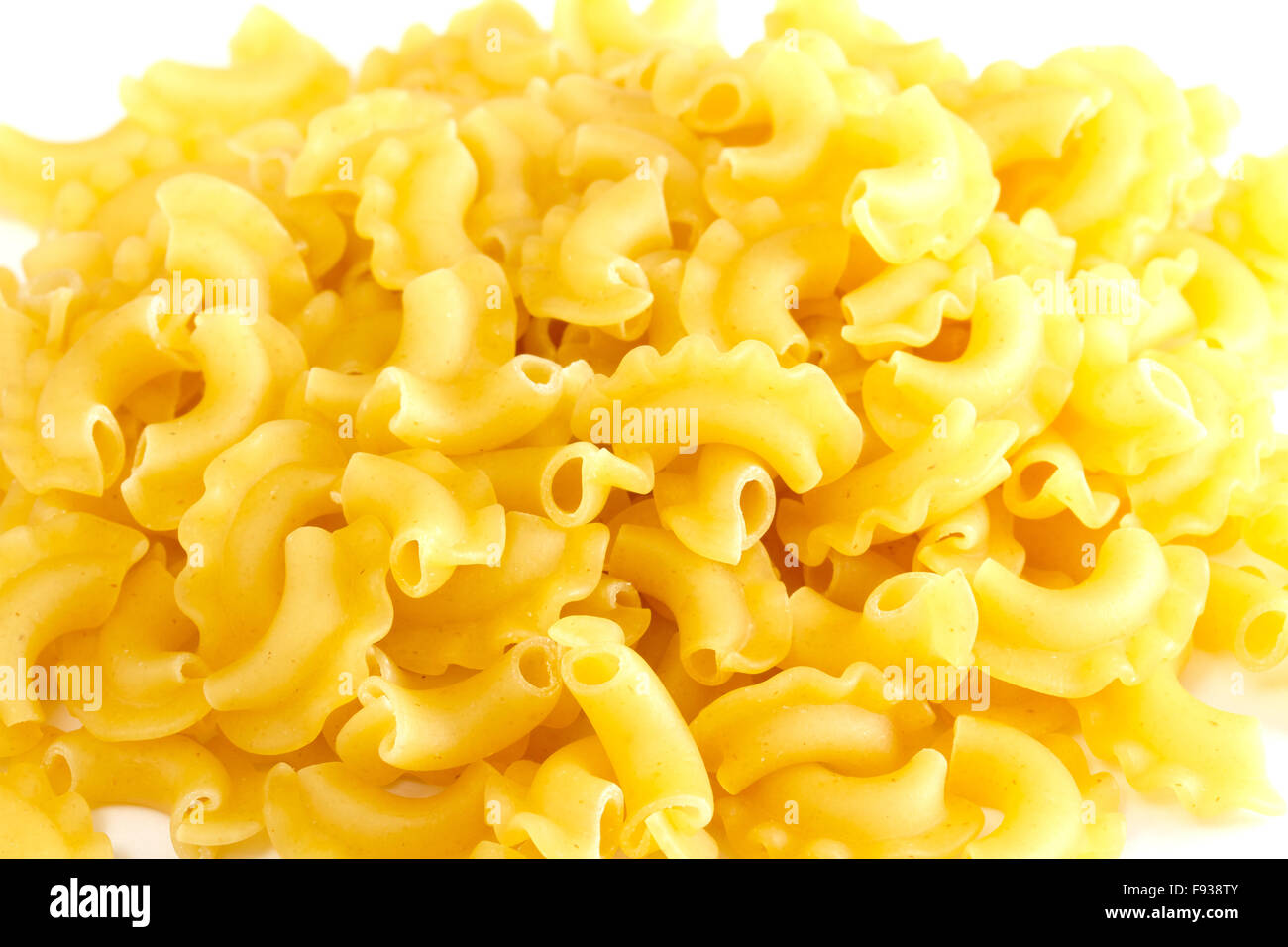 dried italian pasta (macaroni) isolated on white background Stock Photo ...