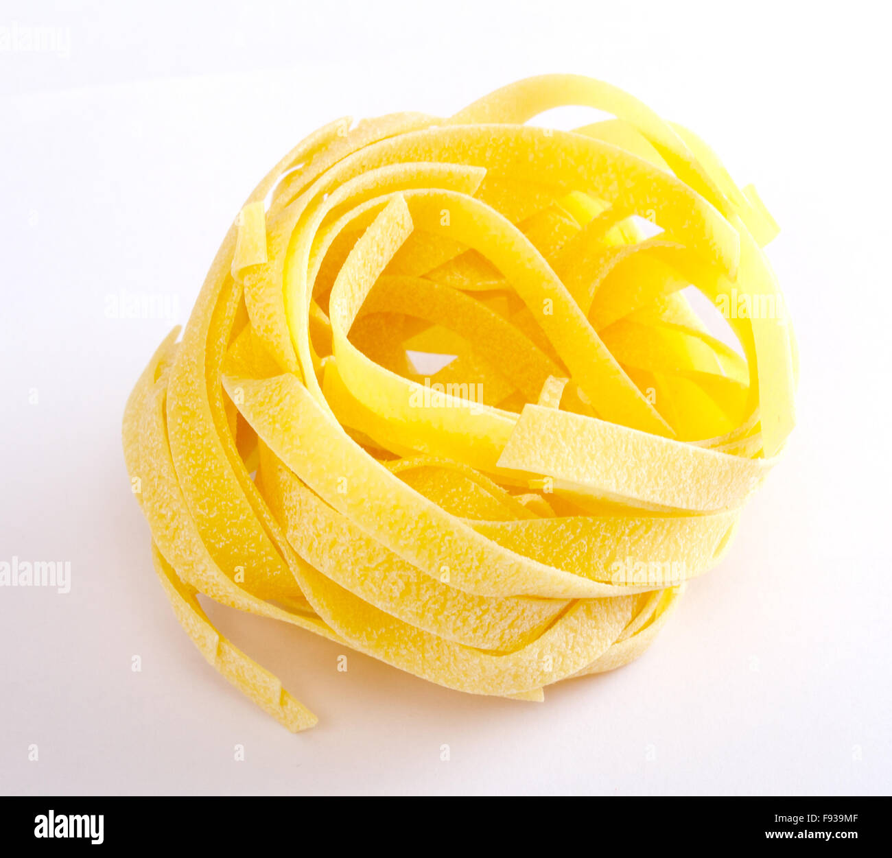 dried italian pasta (macaroni) isolated on white background Stock Photo ...