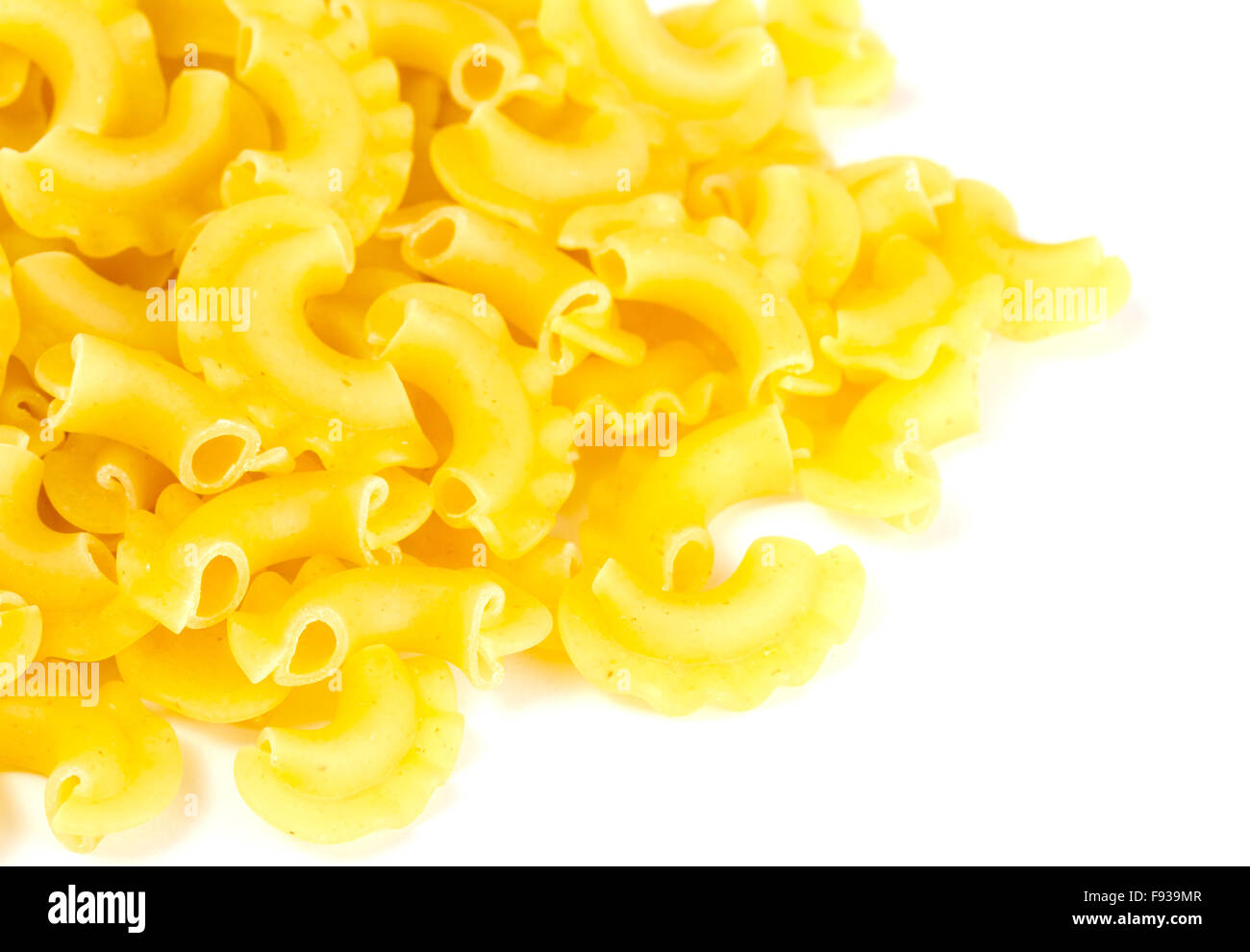 dried italian pasta (macaroni) isolated on white background Stock Photo ...