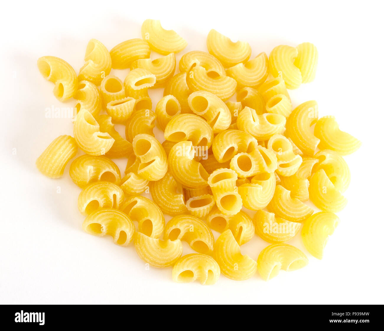 dried italian pasta (macaroni) isolated on white background Stock Photo ...