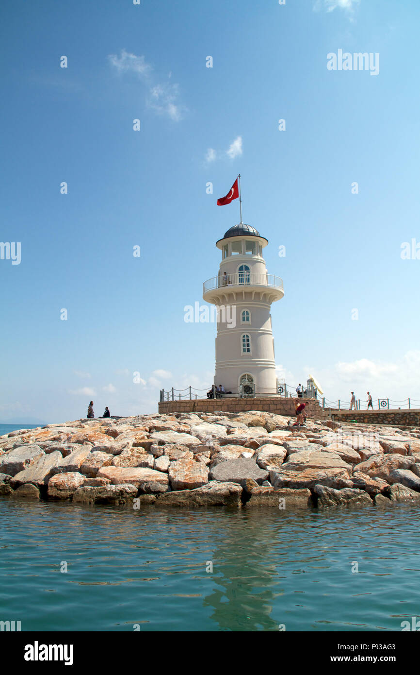 Lighthouse in port. Turkey, Alanya. Sunny weather Stock Photo - Alamy