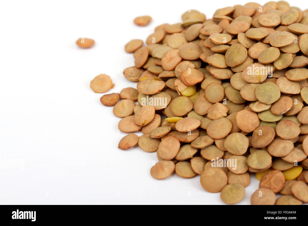 Pile of green lentils from low perspective isolated on white Stock ...