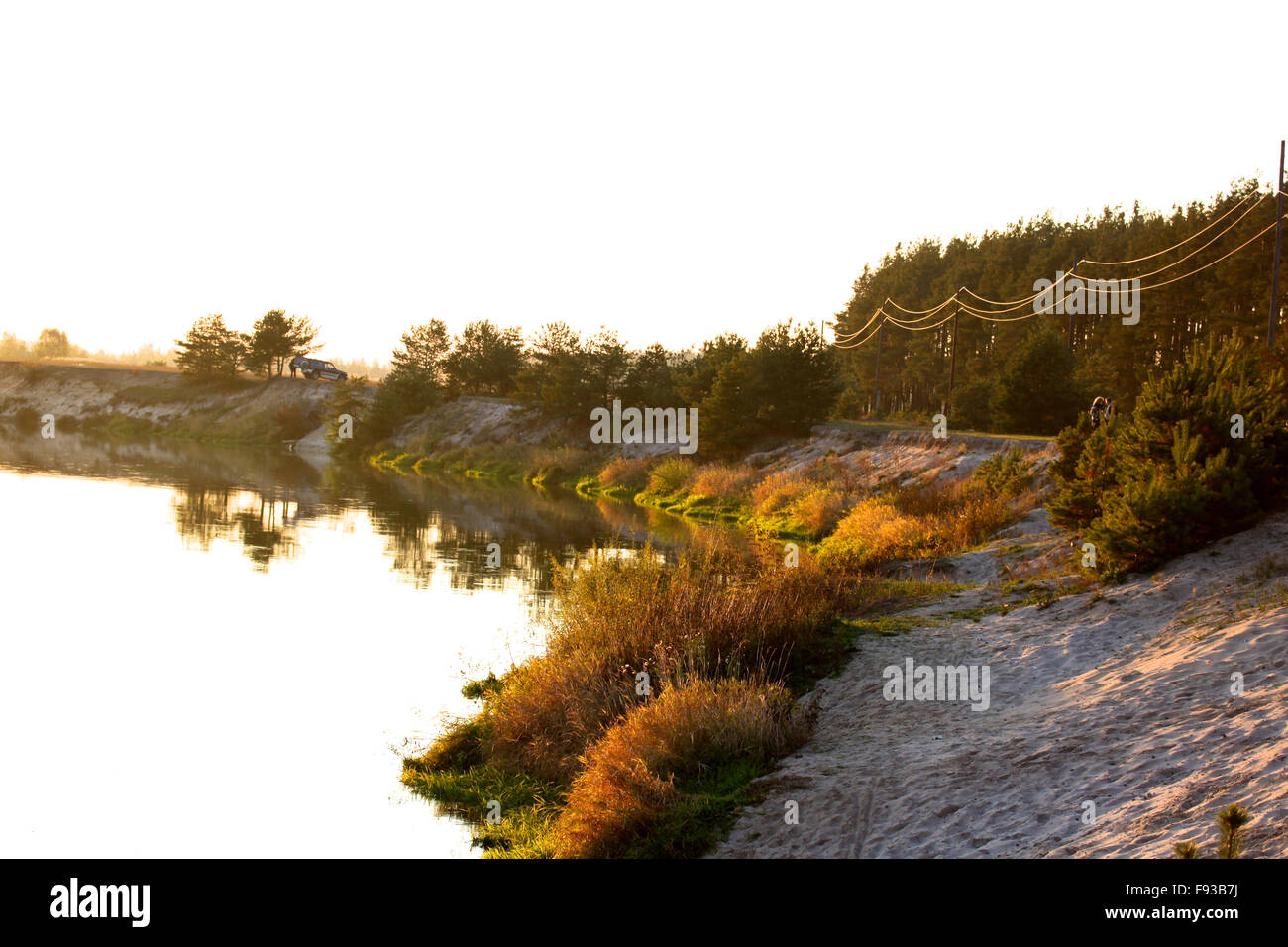 Colorful autumn trees fortress at the river front Stock Photo - Alamy