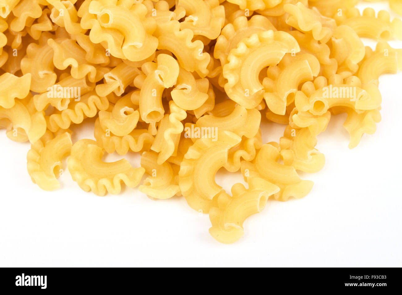 close up of a dried italian pasta on white background Stock Photo - Alamy