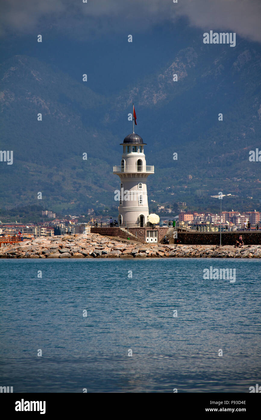 Lighthouse in port. Turkey, Alanya. Sunny weather Stock Photo - Alamy