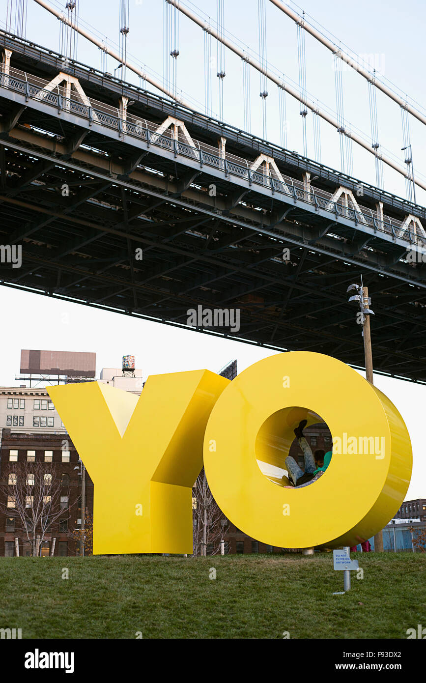 The OY YO sign in Dumbo Brooklyn with the Manhattan bridge in the ...