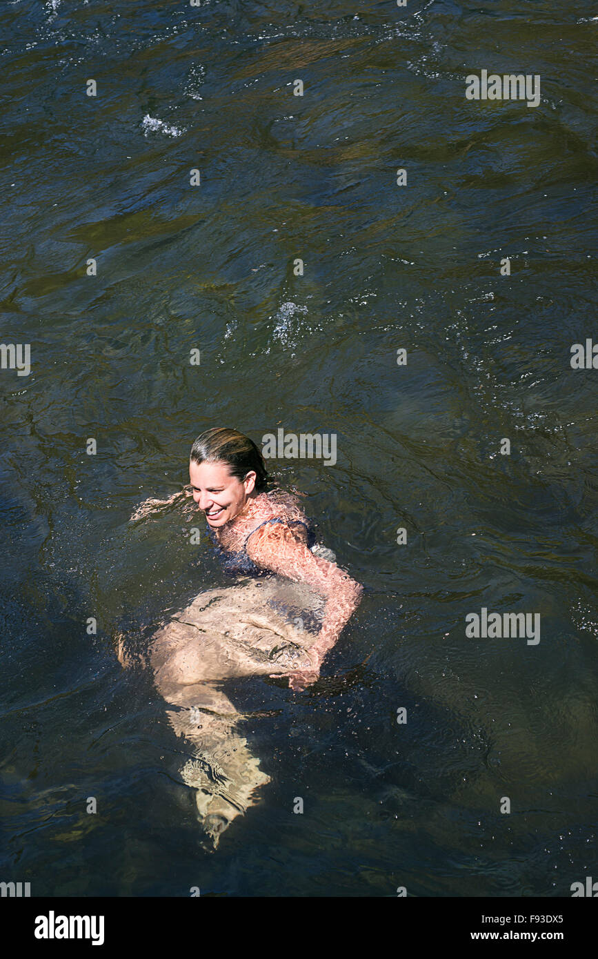 Woman swimming in river hi-res stock photography and images - Alamy
