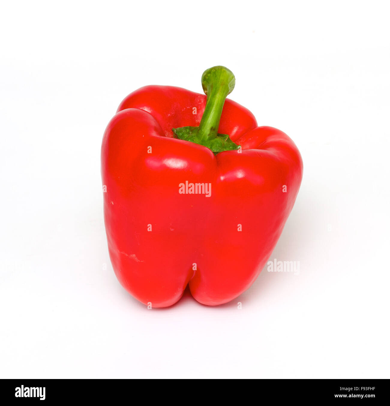 Bright red pepper isolated on white Stock Photo - Alamy
