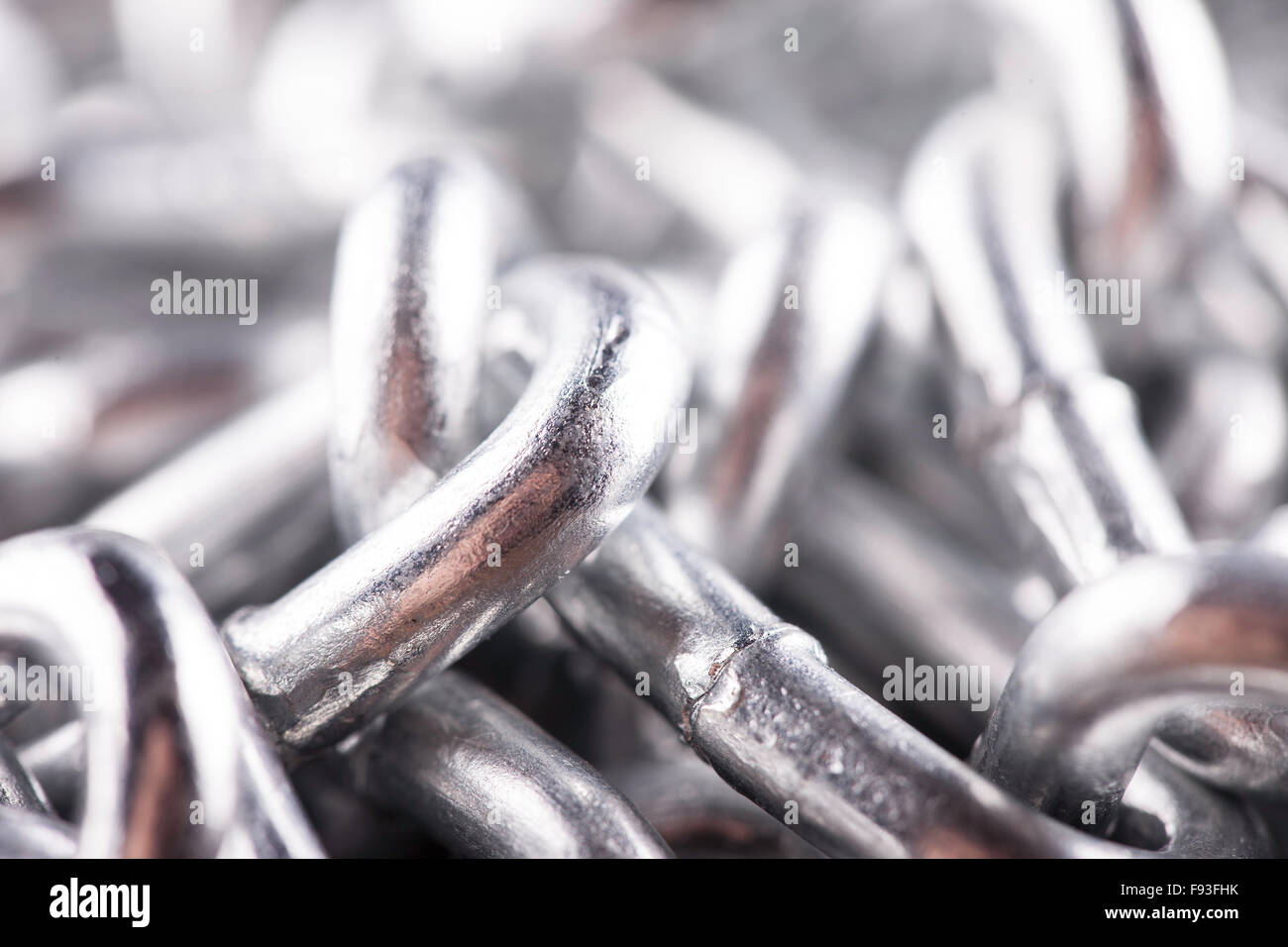 silver chain pile closeup Stock Photo - Alamy