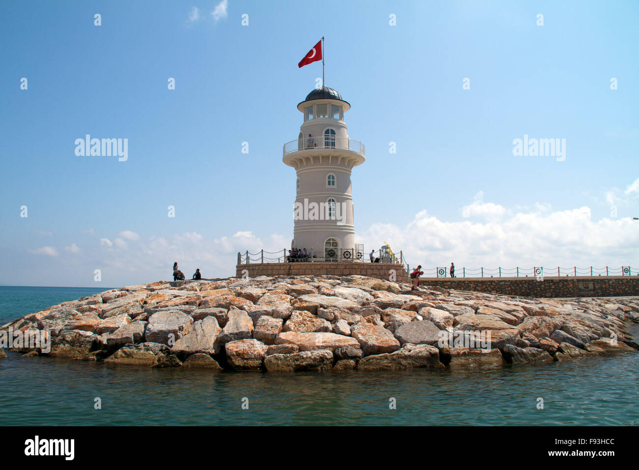Lighthouse in port. Turkey, Alanya. Sunny weather Stock Photo - Alamy