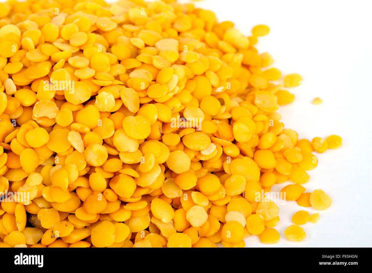 Yellow lentils isolated on white background.Macro shot Stock Photo - Alamy