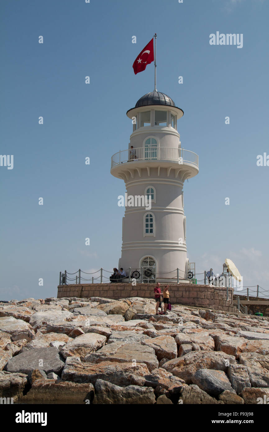 Lighthouse in port. Turkey, Alanya. Sunny weather Stock Photo - Alamy