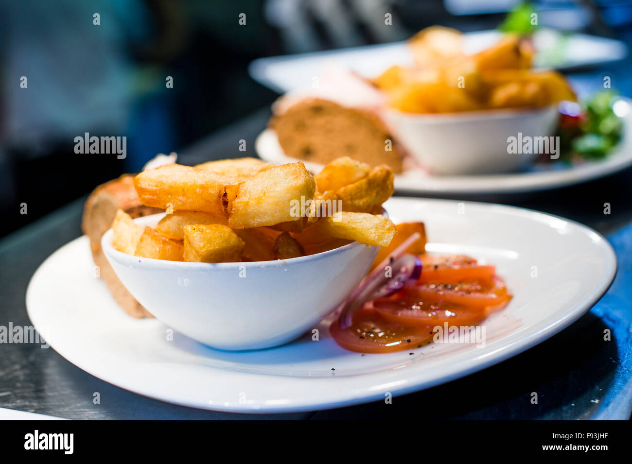 Plates of food (bowls of rough cut chips) at The Cross Foxes , 5 five ...