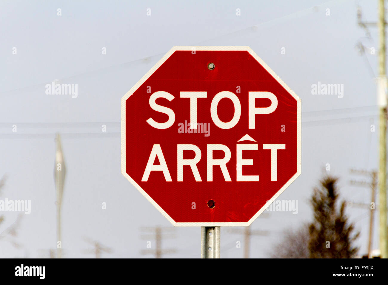 Canadian stop sign in both English and French Stock Photo - Alamy