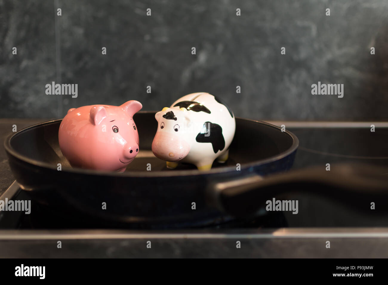 Pig and cow in a pan Stock Photo - Alamy