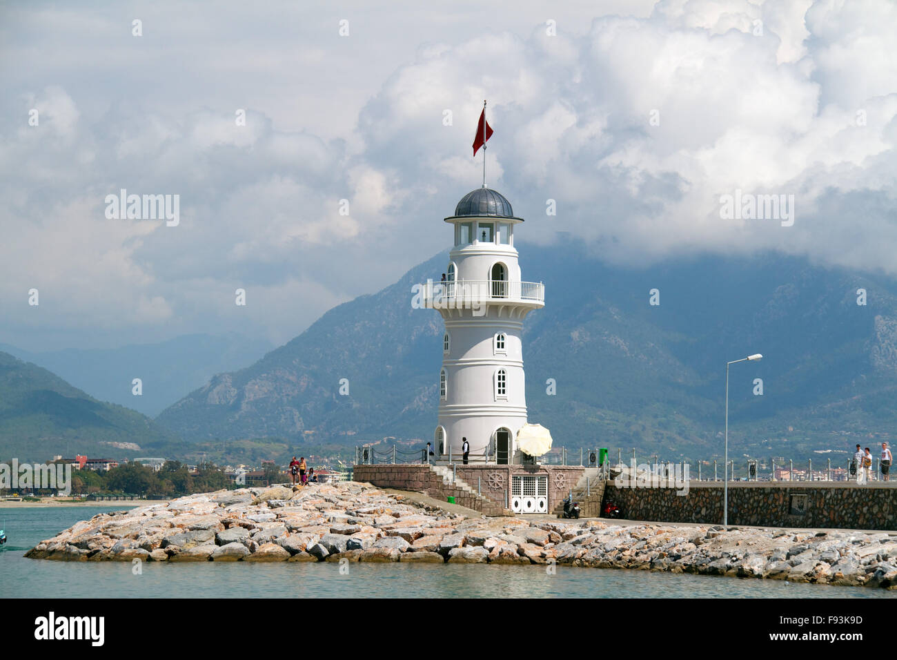 Lighthouse in port. Turkey, Alanya. Sunny weather Stock Photo - Alamy