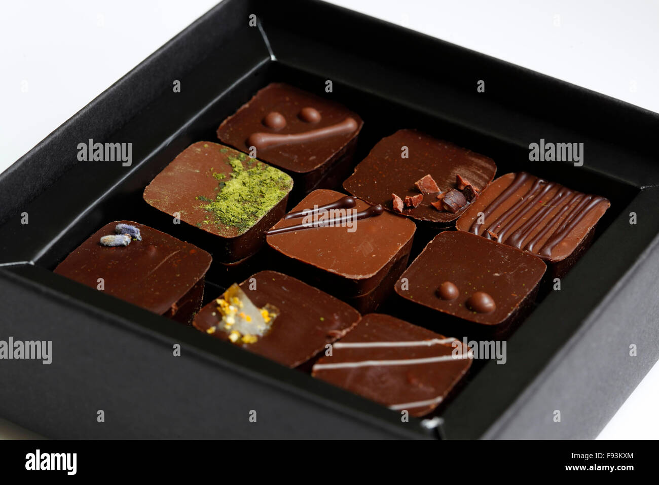 Chocolate candies in a box Stock Photo - Alamy