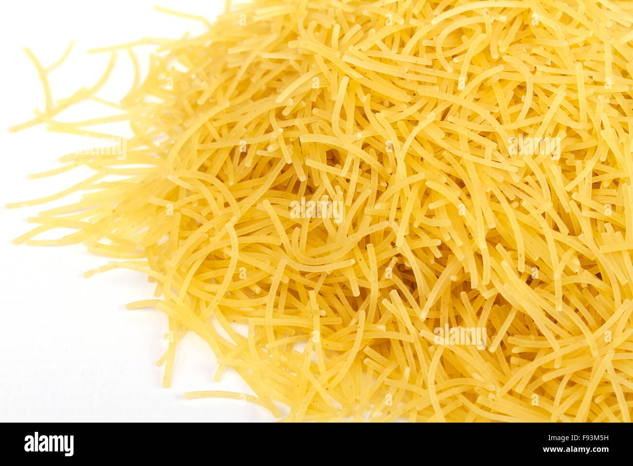 close up of a dried italian pasta on white background Stock Photo - Alamy