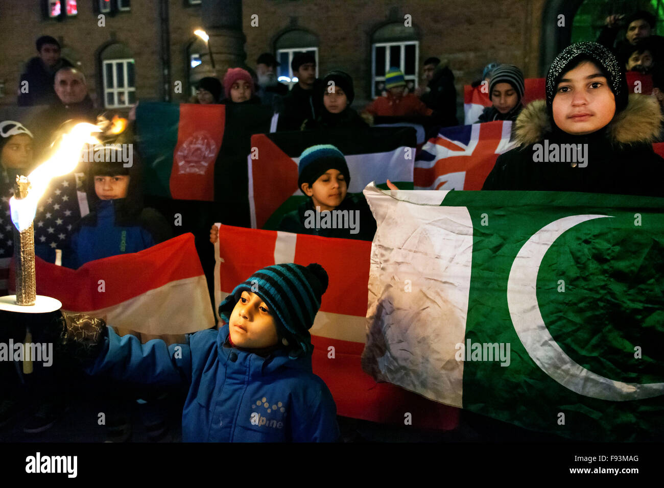 Copenhagen, Denmark. 13th December, 2015. Muslim children display flags ...