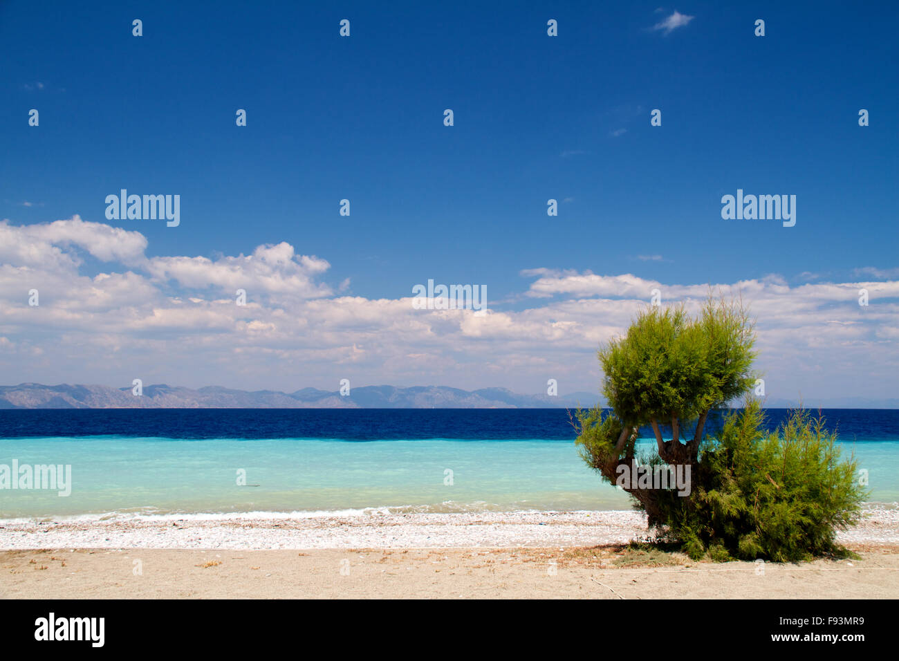 Picturesque beach on Rhodes Stock Photo - Alamy