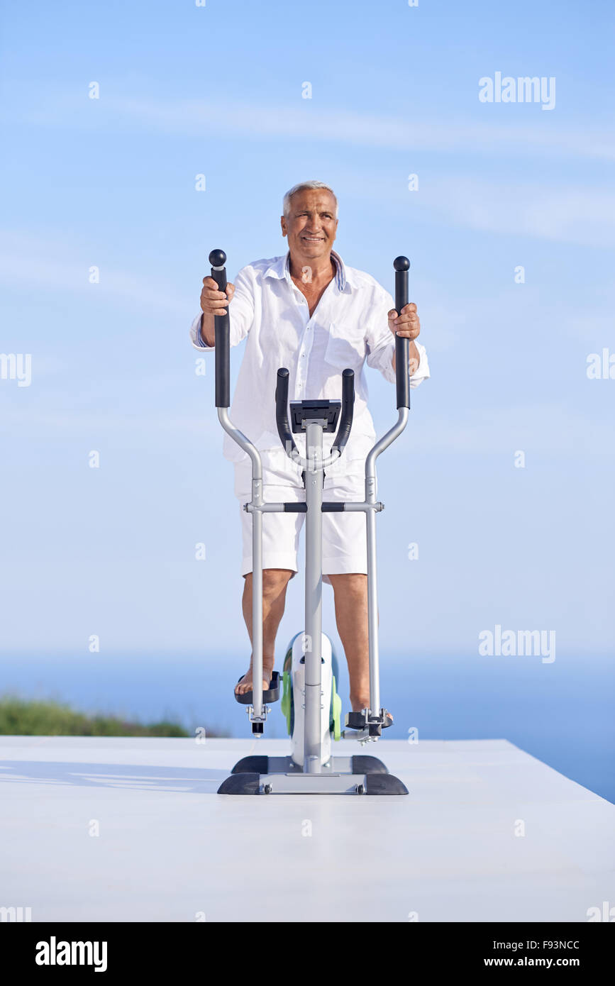 Older man running treadmill hi-res stock photography and images - Alamy