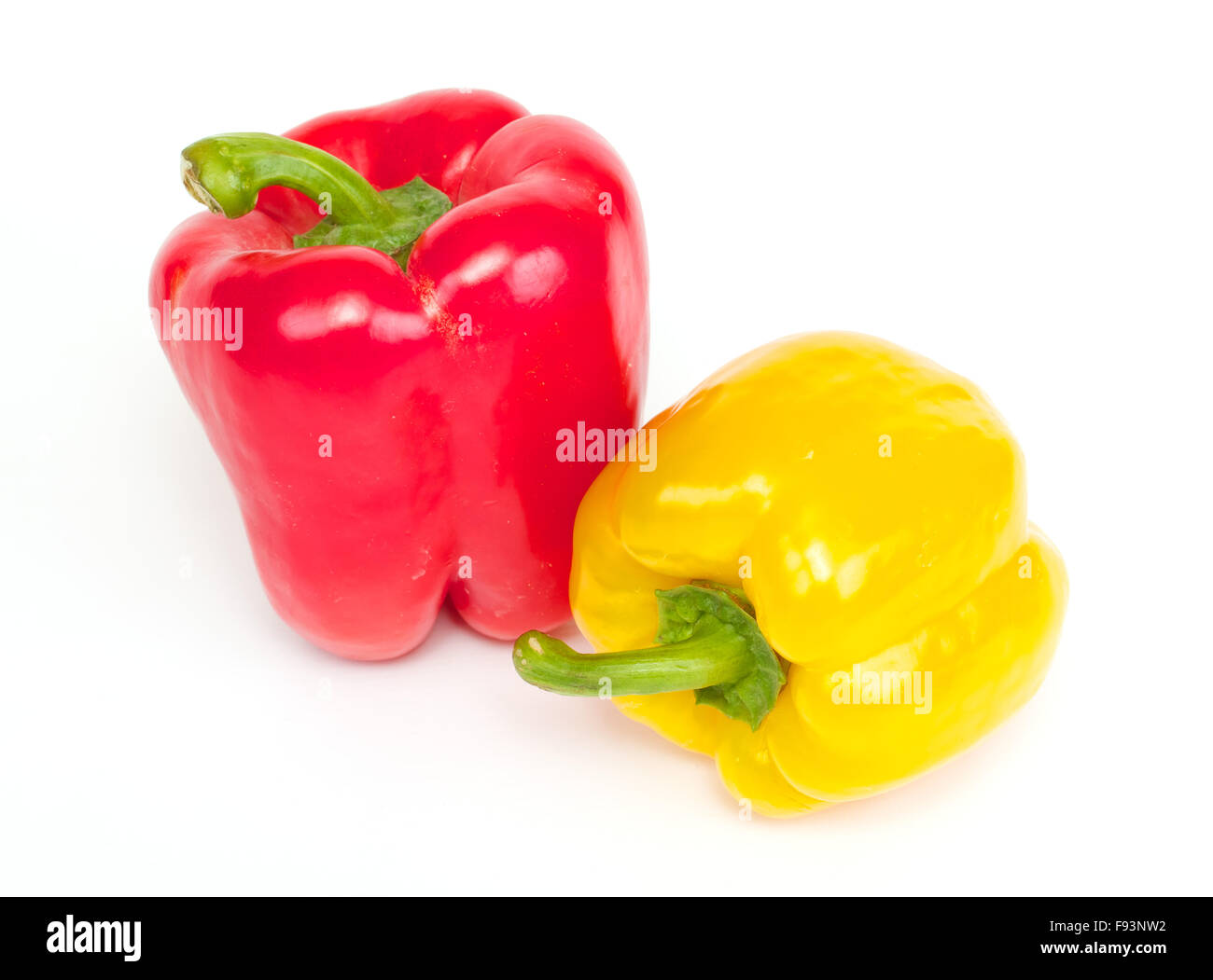 Red and yellow pepper are isolated on a white background Stock Photo ...