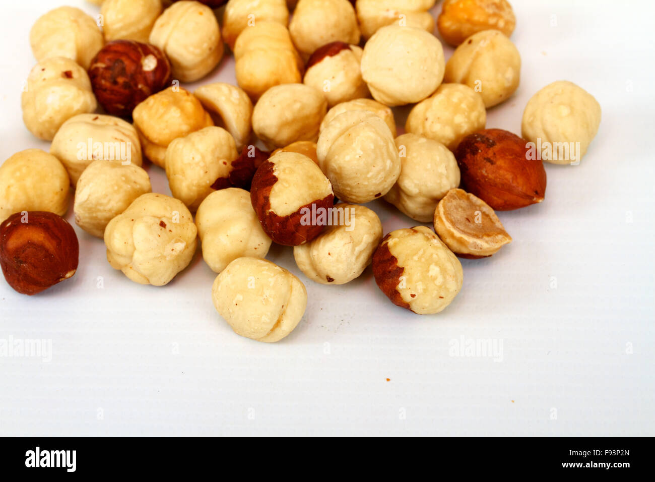 hazelnuts on a white background Stock Photo - Alamy