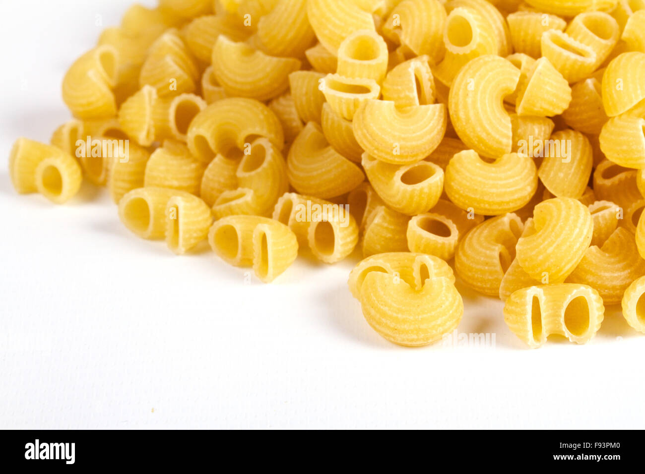close up of a dried italian pasta on white background Stock Photo - Alamy